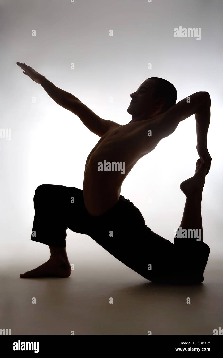 Profile of sporty guy doing physical exercise Stock Photo - Alamy