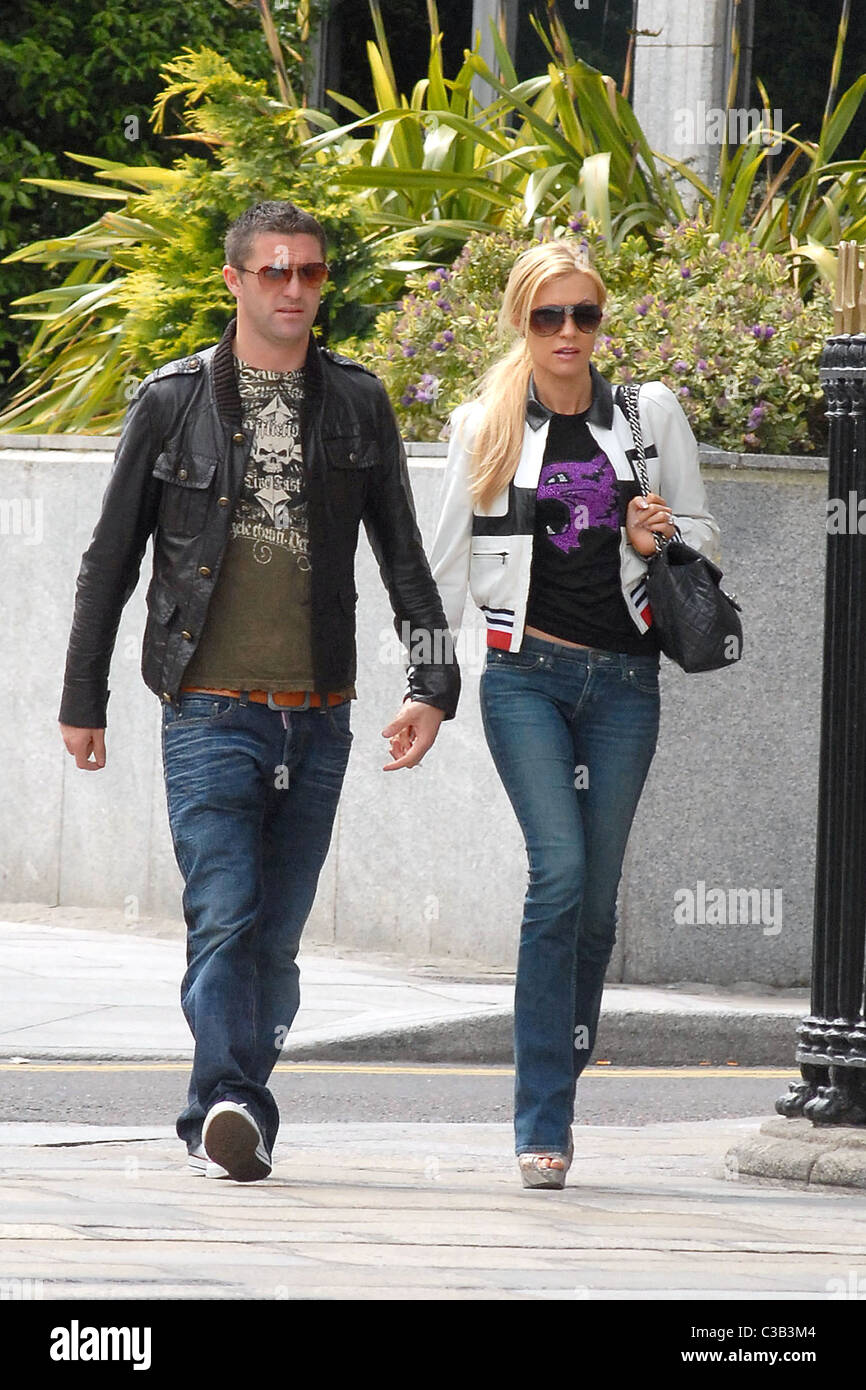 Footballer Robbie Keane and his wife, Claudine, out shopping on Grafton ...