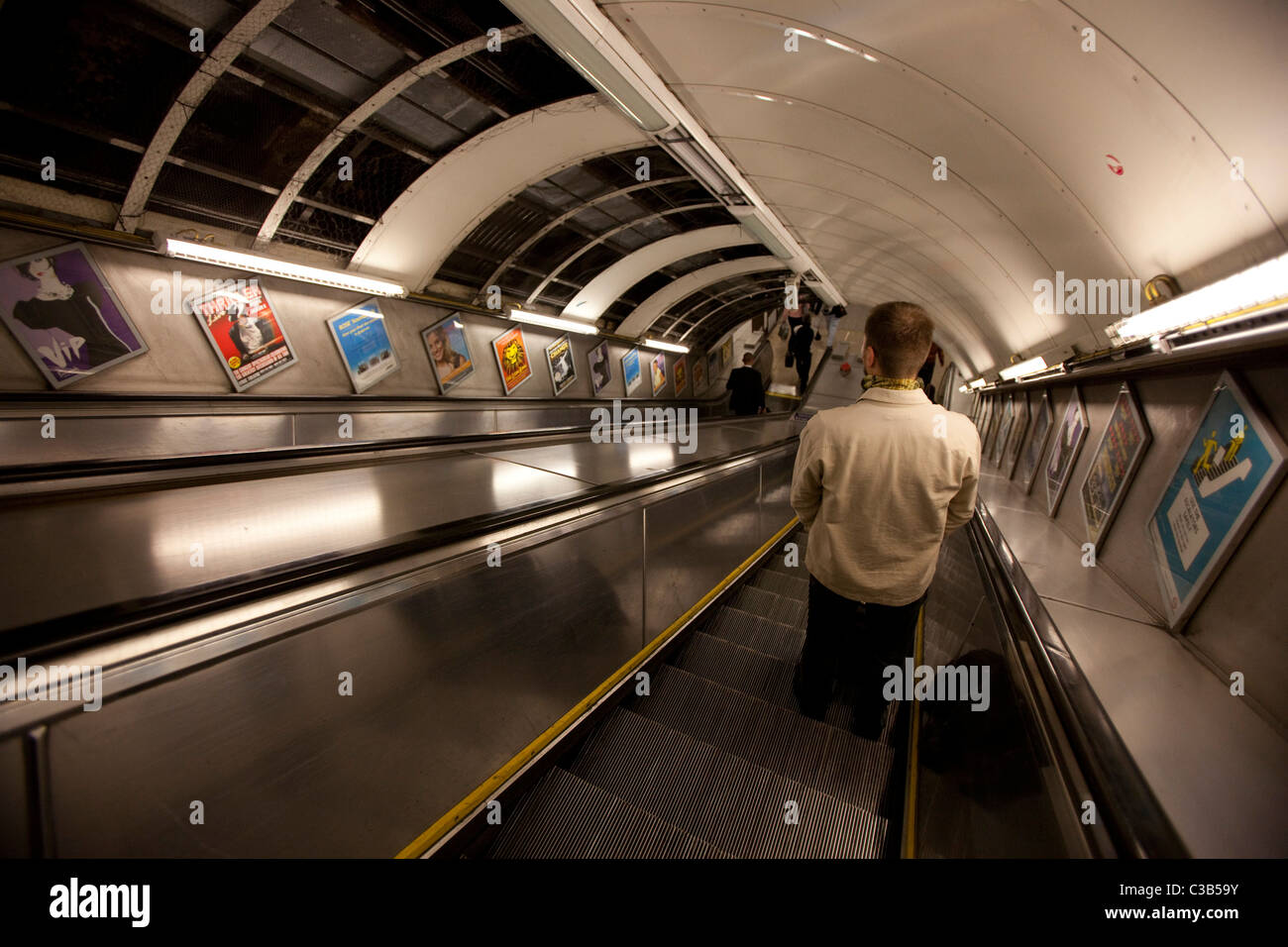 The underground escalator system at Oxford circus station Stock Photo ...