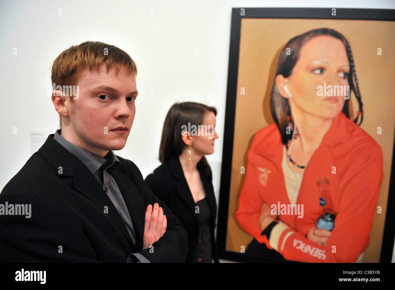 Mark Jameson, winner of the young artist award, with his painting ...