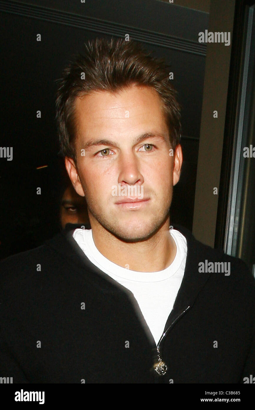 Doug Reinhardt is surrounded by photographers as she leaves the Mayfair ...