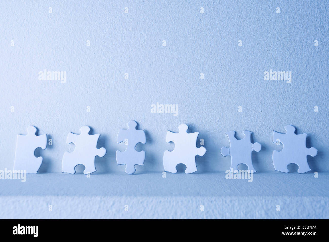 Series of conceptual shots with blank jigsaw puzzles Stock Photo - Alamy