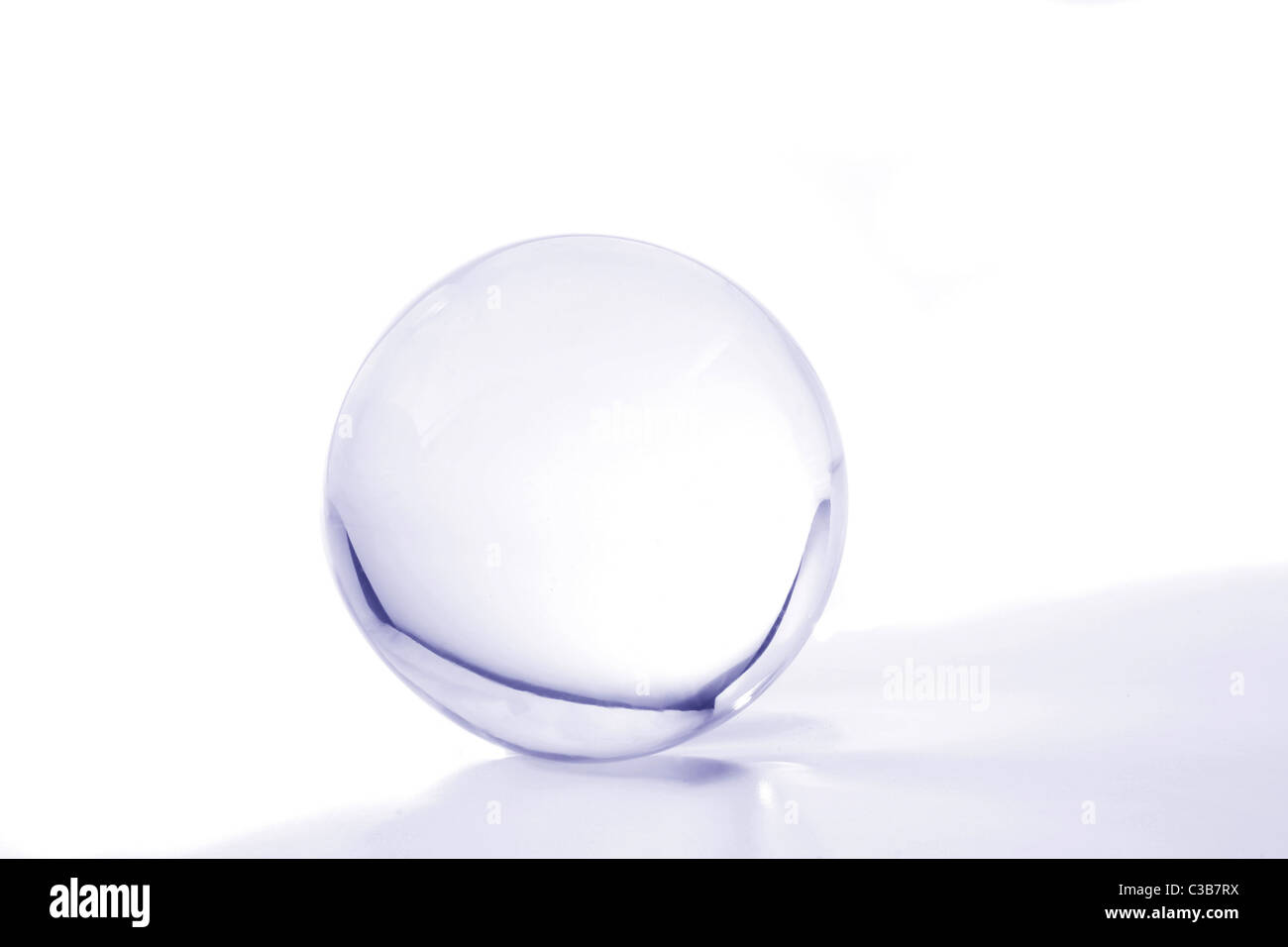 Crystal ball with blue light and shadow Stock Photo - Alamy