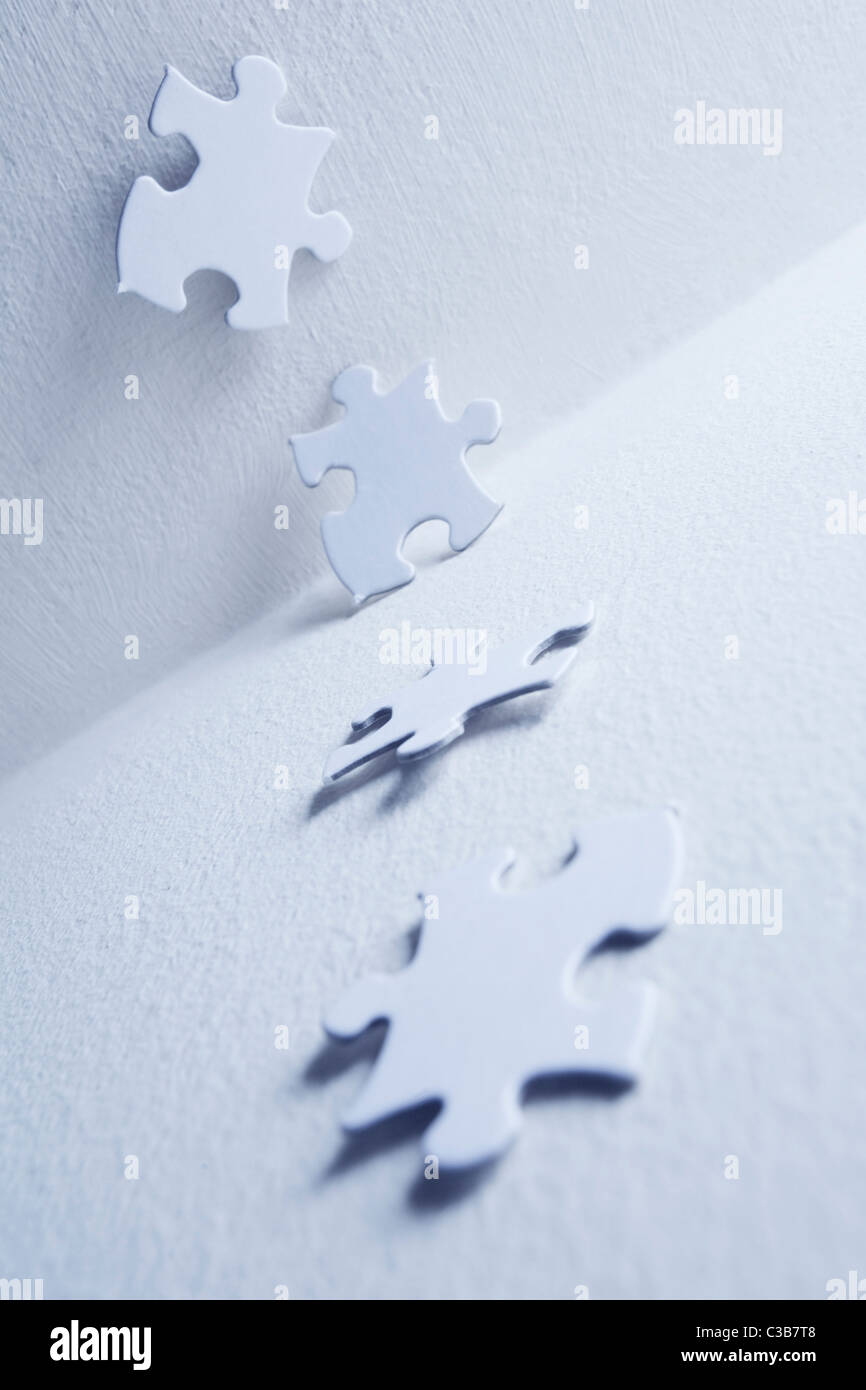 Series of conceptual shots with blank jigsaw puzzles Stock Photo - Alamy