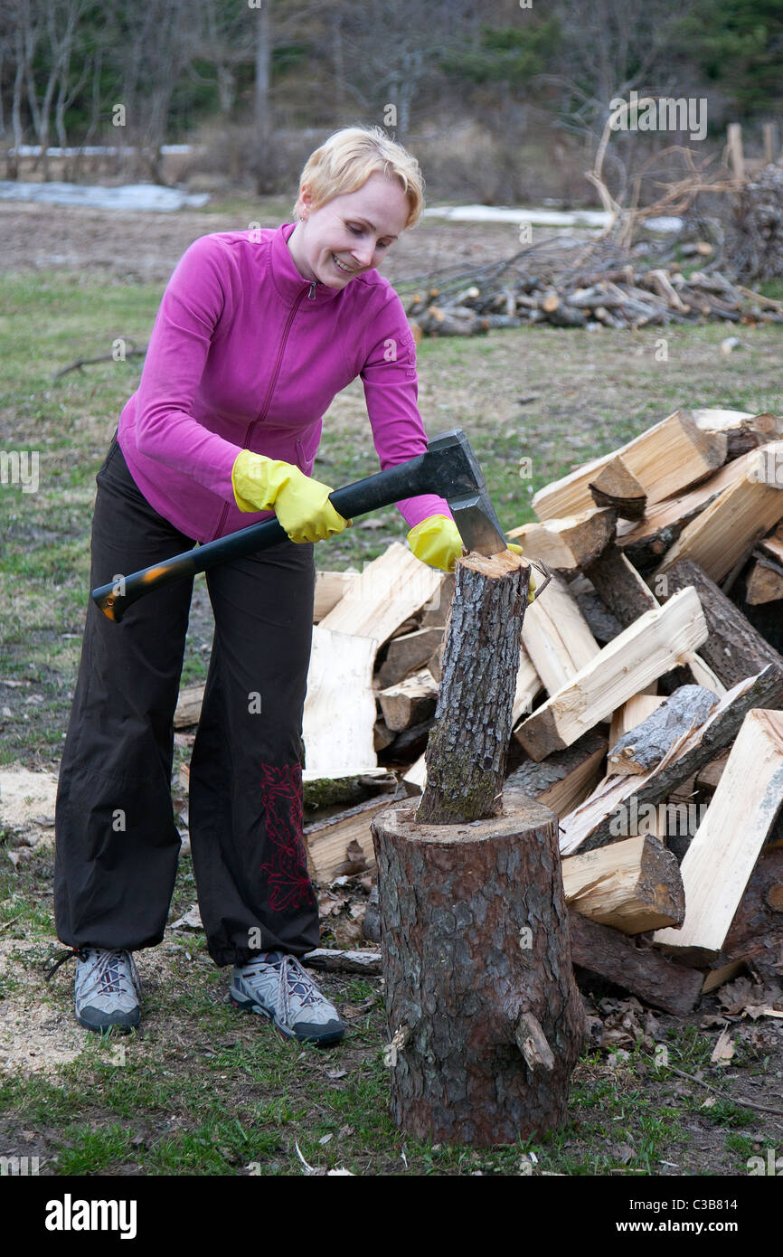 Woman Chopping Wood Axe High Resolution Stock Photography and Images ...