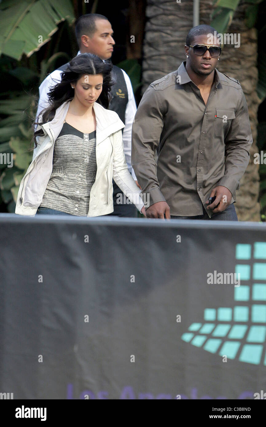 Kim Kardashian and Reggie Bush Celebrities arrive to watch the Los ...