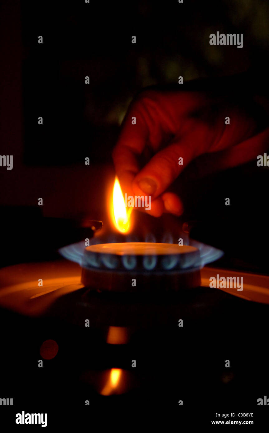 Lighting gas with match hi-res stock photography and images - Alamy