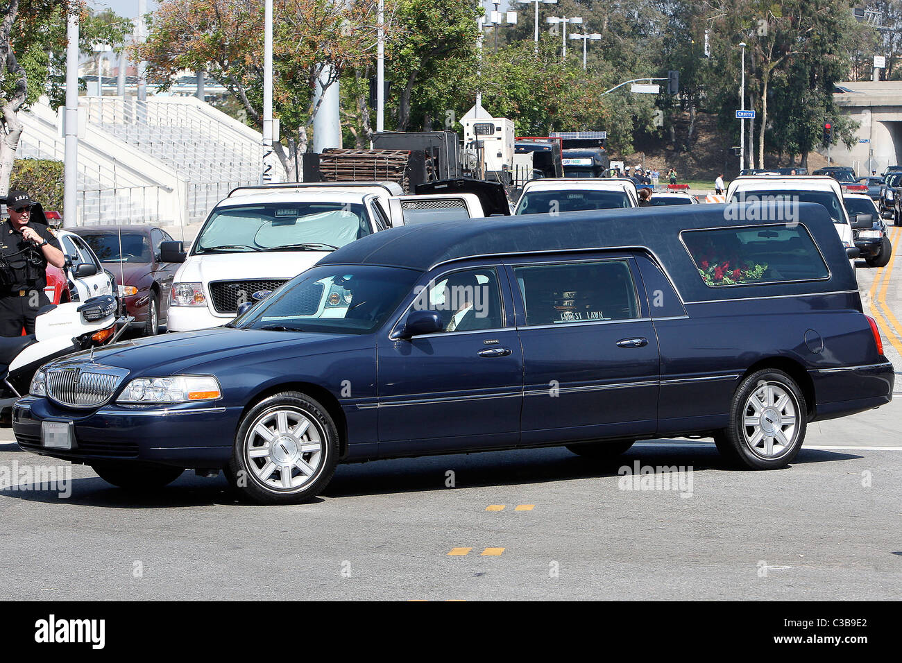 The hearse carrying the rose covered casket of the King of Pop, Michael ...