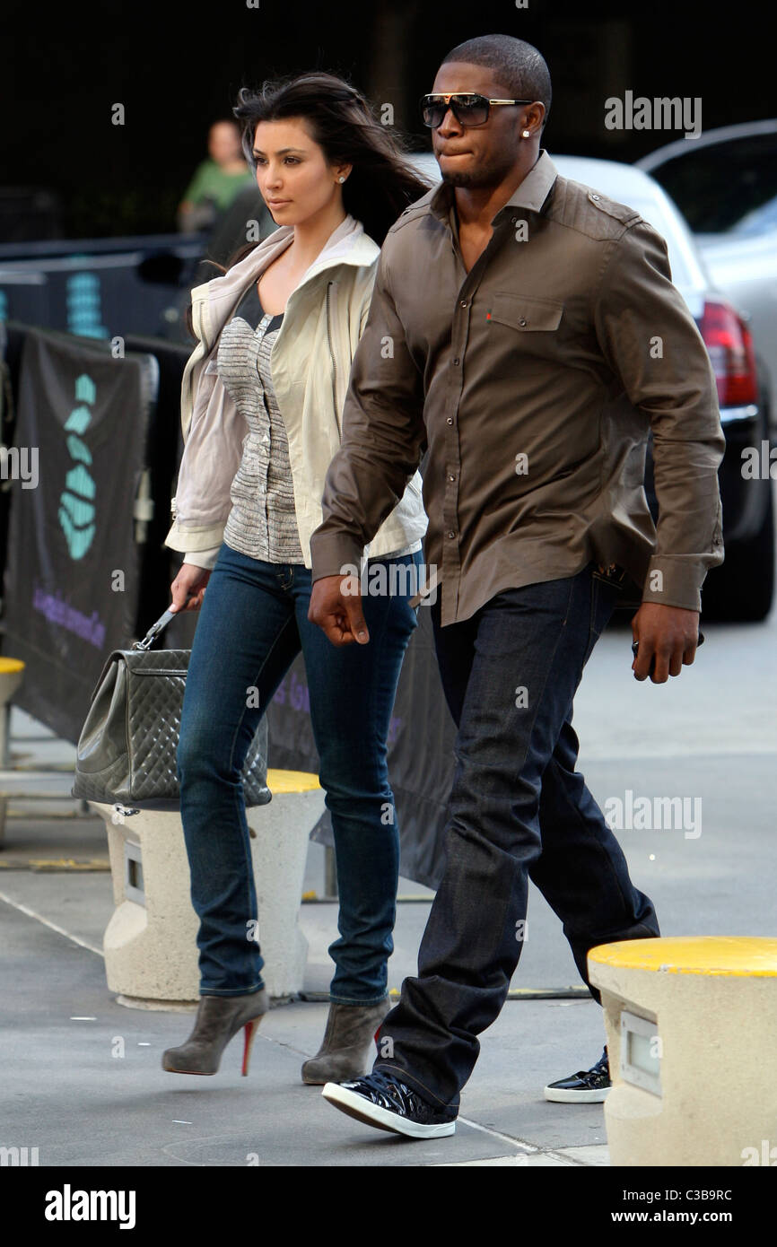 Kim Kardashian and Reggie Bush Celebrities arrive to watch the Los ...