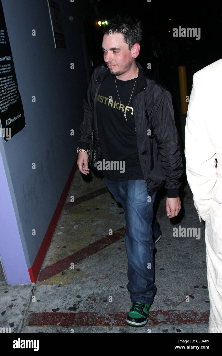 DJ AM, aka Adam Goldstein, and his girlfriend head back to their car ...