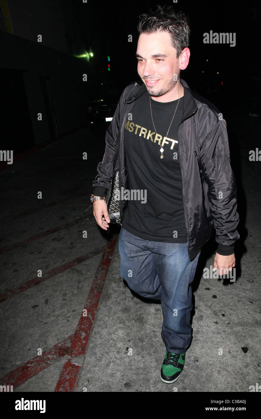 DJ AM, aka Adam Goldstein, and his girlfriend head back to their car ...