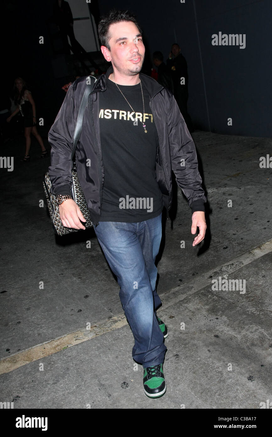 DJ AM, aka Adam Goldstein, and his girlfriend head back to their car ...