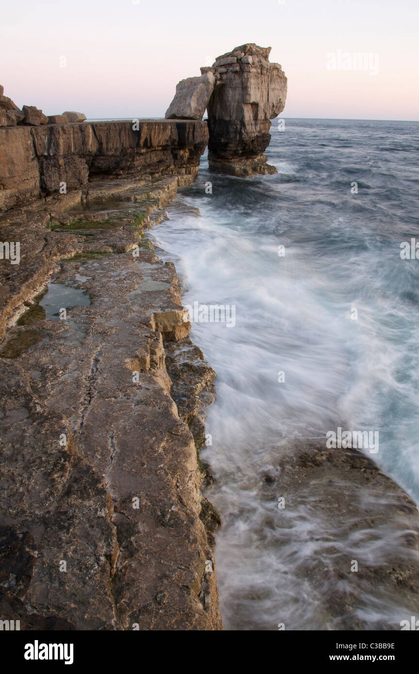 Pulpit Rock in a stormy sea. This massive limestone stack stands just ...