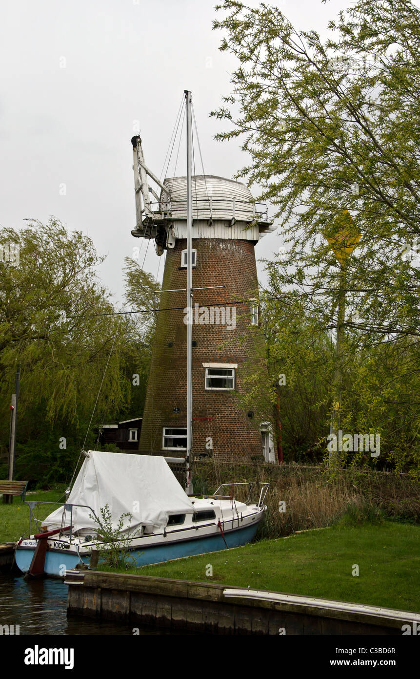 Old windmill converted into a house on the River Thurne, Norfolk Broads ...