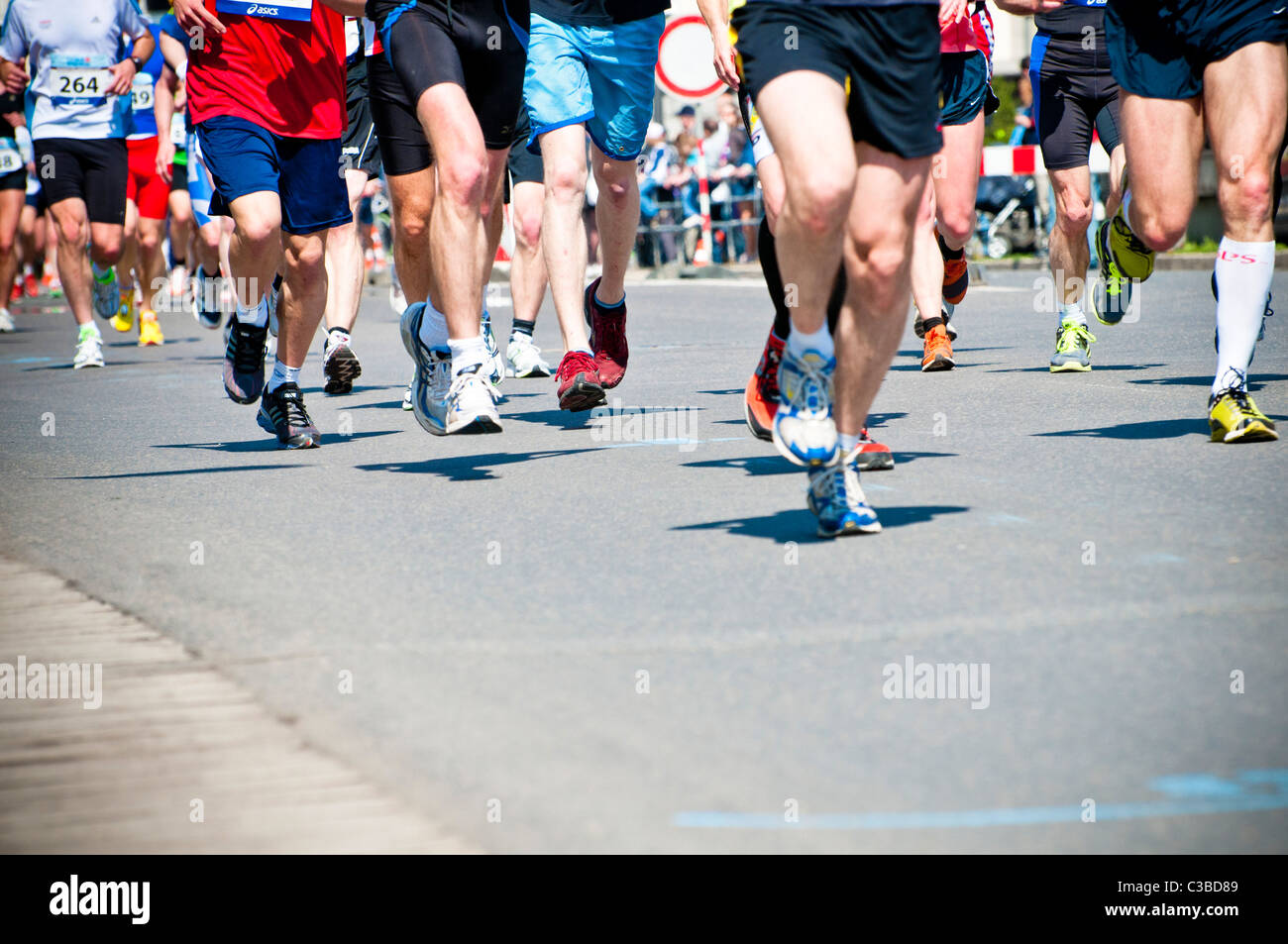 marathon runners legs Stock Photo - Alamy