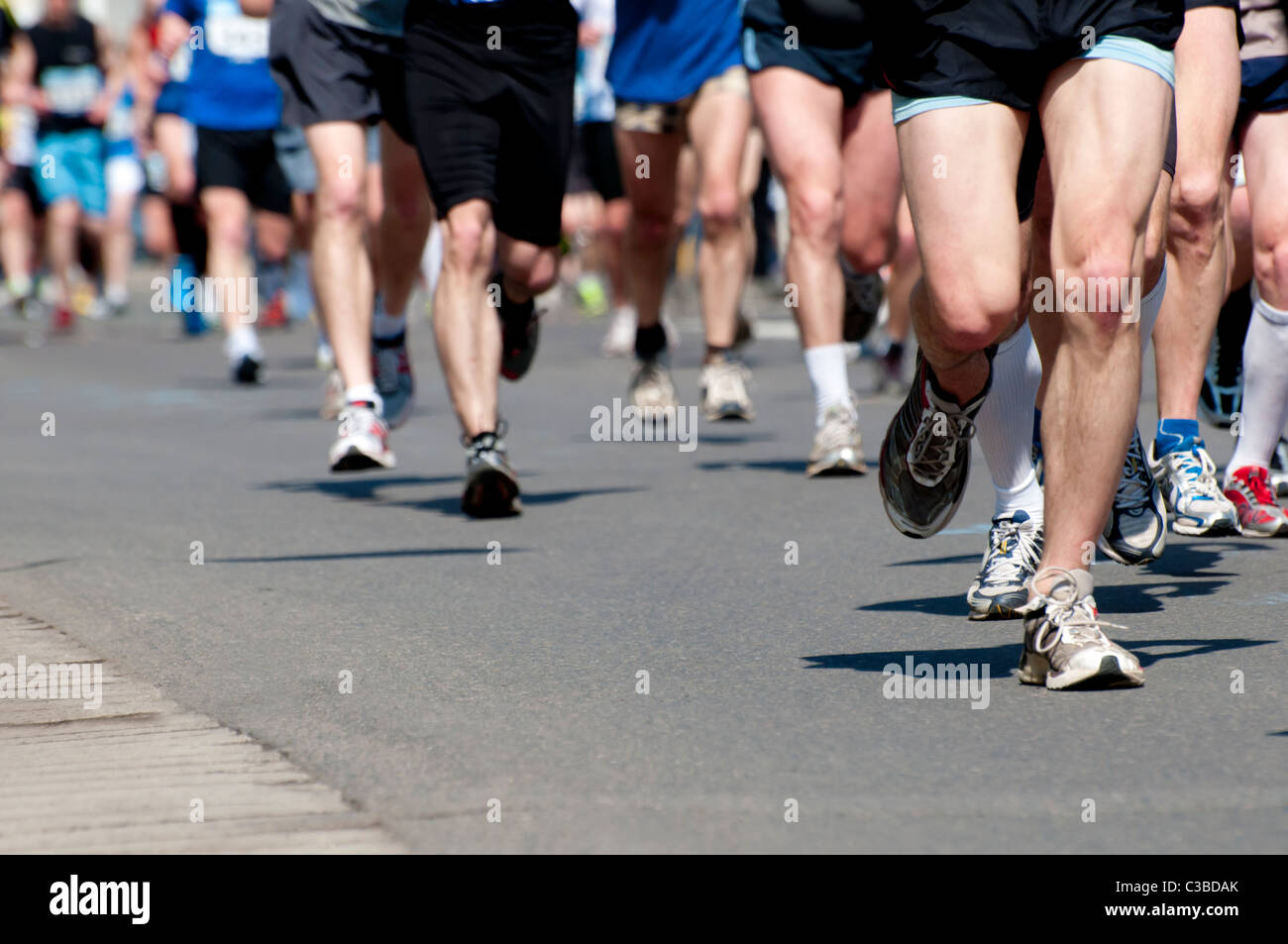 marathon runners legs Stock Photo - Alamy