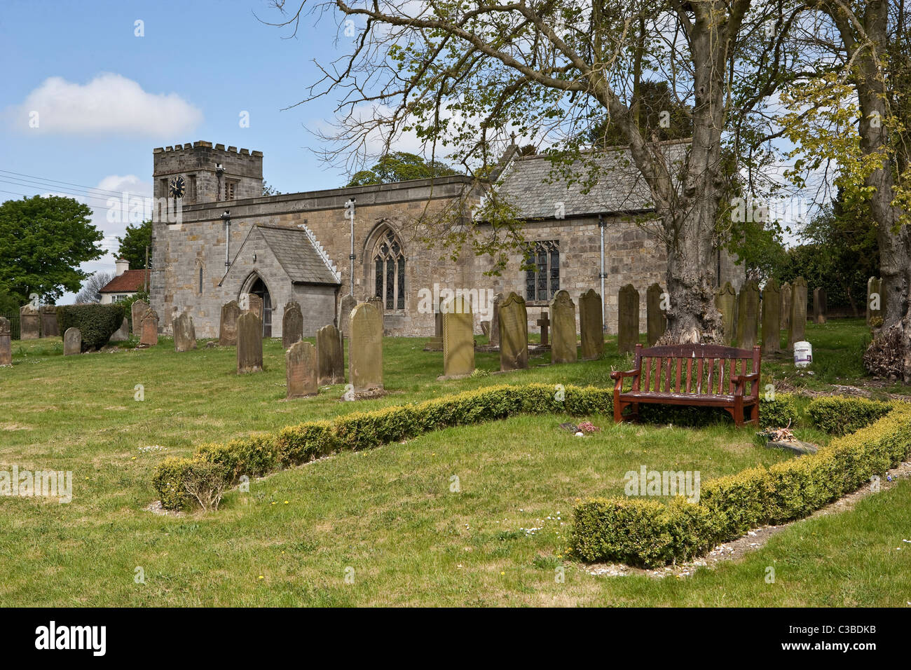 Side door and sign at All Saints Church Thwing East Yorkshire Stock ...