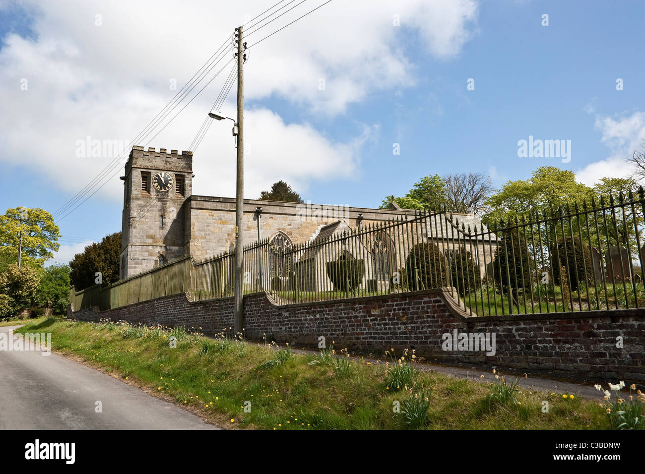 Side door and sign at All Saints Church Thwing East Yorkshire Stock ...