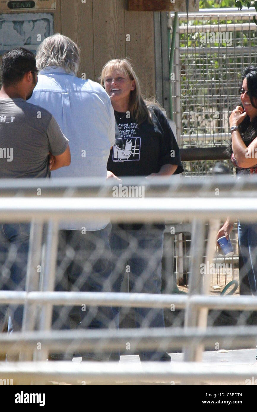 Debbie Rowe spends time with her horses at home, styling their hair ...