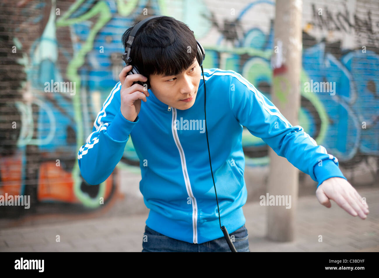 Listening to Music with Hand Gestures Stock Photo - Alamy