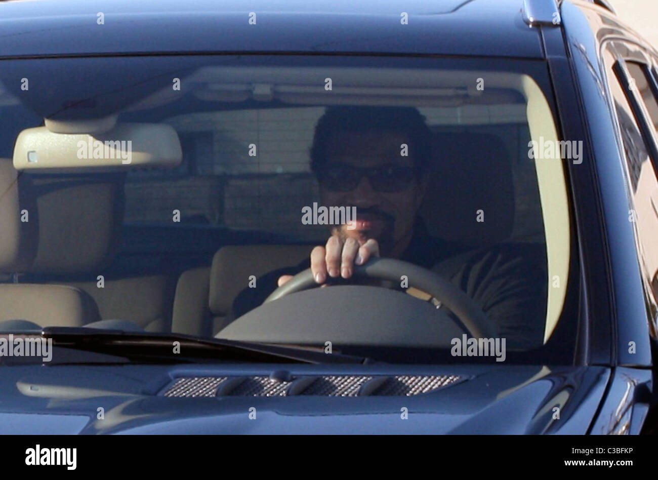 Lionel Richie leaving Maxfield on Melrose Avenue in his Mercedes-Benz ...