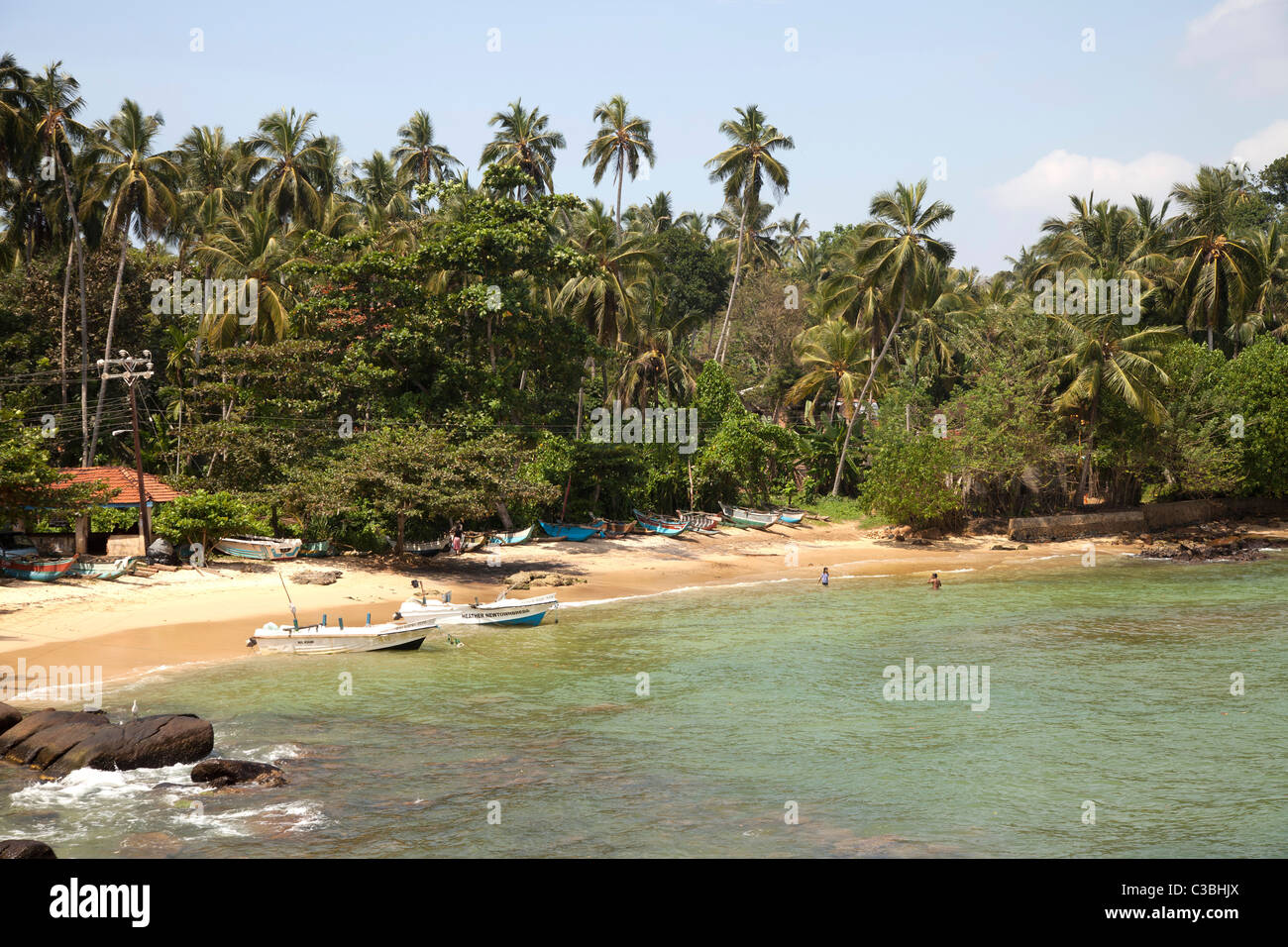 beach with fishing boats near Dondra Head on the southern tip of the ...