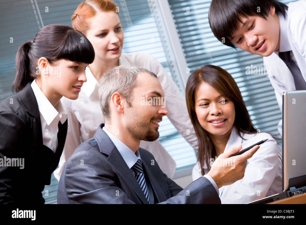 Boss hand pointing laptop screen hi-res stock photography and images ...