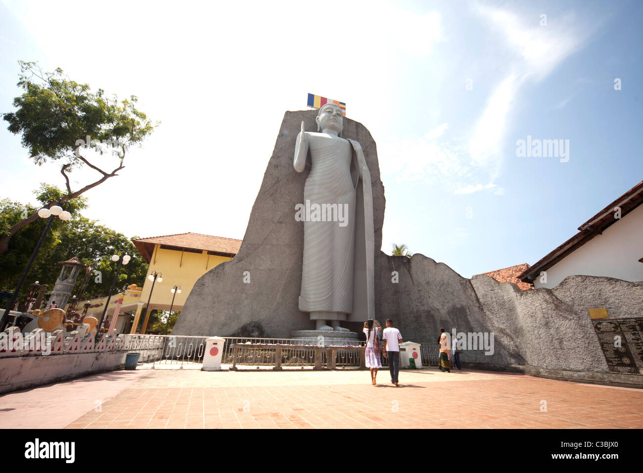 giant standing buddha at the Devinuwara Devalaya Temple in Dondra ...