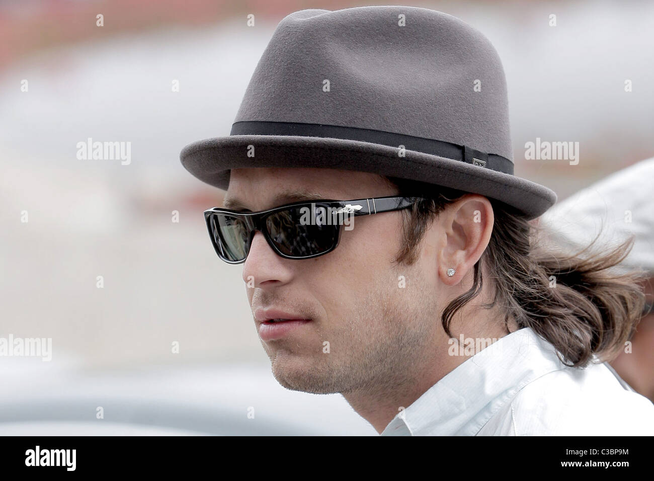 Nathan Followill from the band Kings of Leon boarding an American ...