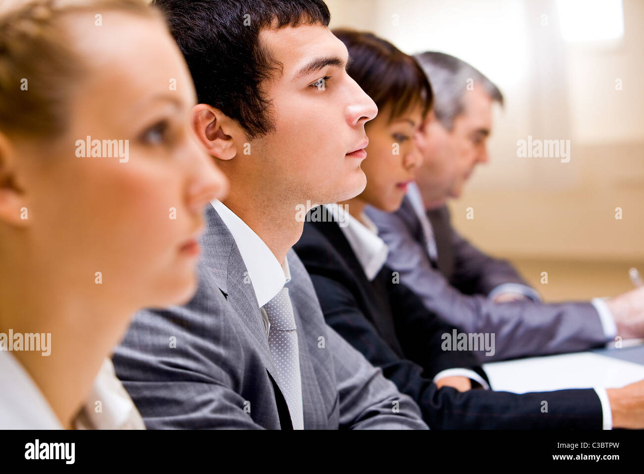 Image of businessman among his colleagues at conference Stock Photo - Alamy