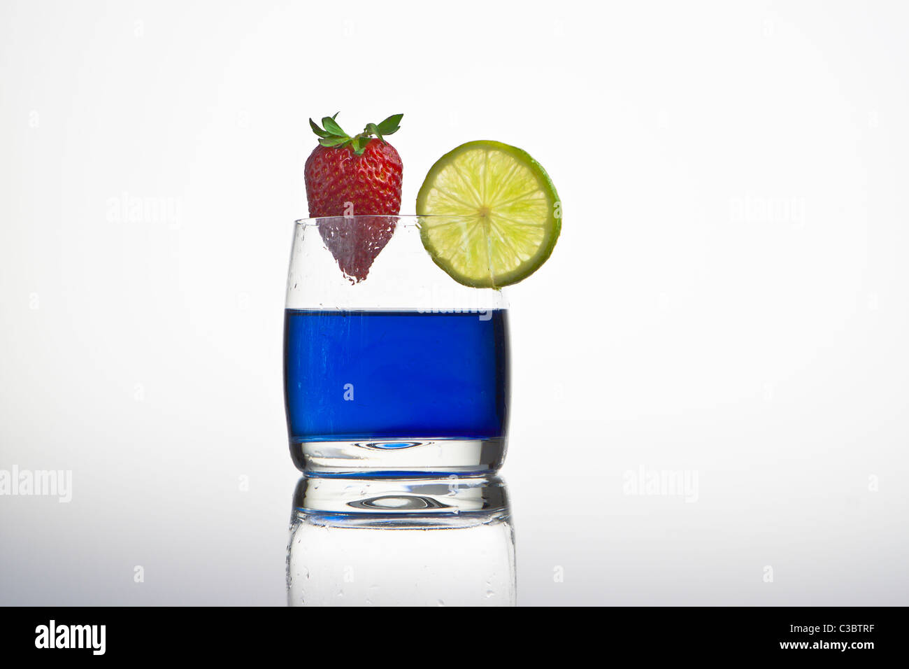 blue cocktail with lemon Stock Photo - Alamy