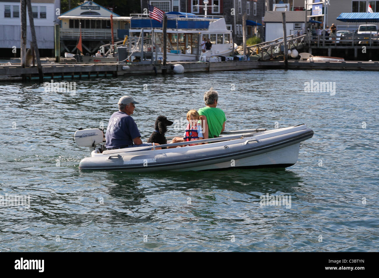 Family going Ashore Stock Photo - Alamy