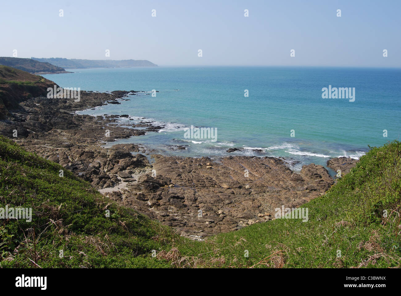 Rocky beach viewed from the cliff top in Brittany, France Stock Photo ...