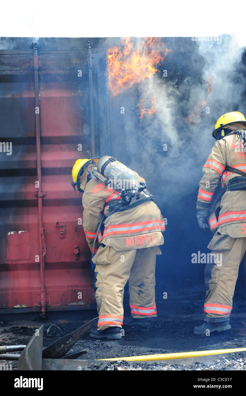 USA Fire Emergency firefighters battling blaze in shipping container ...