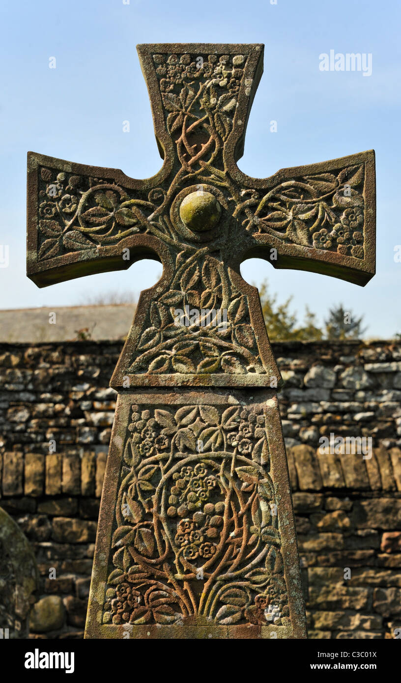 Celtic cross gravestone with stylized floral design. Church of Saint ...