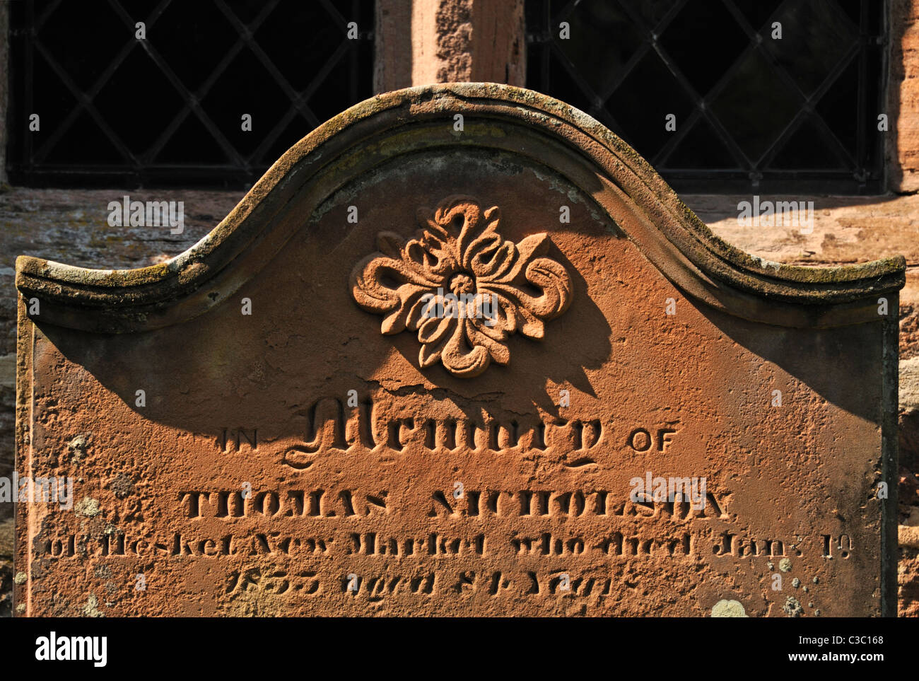 Detail of gravestone with stylized floral design. Church of Saint ...