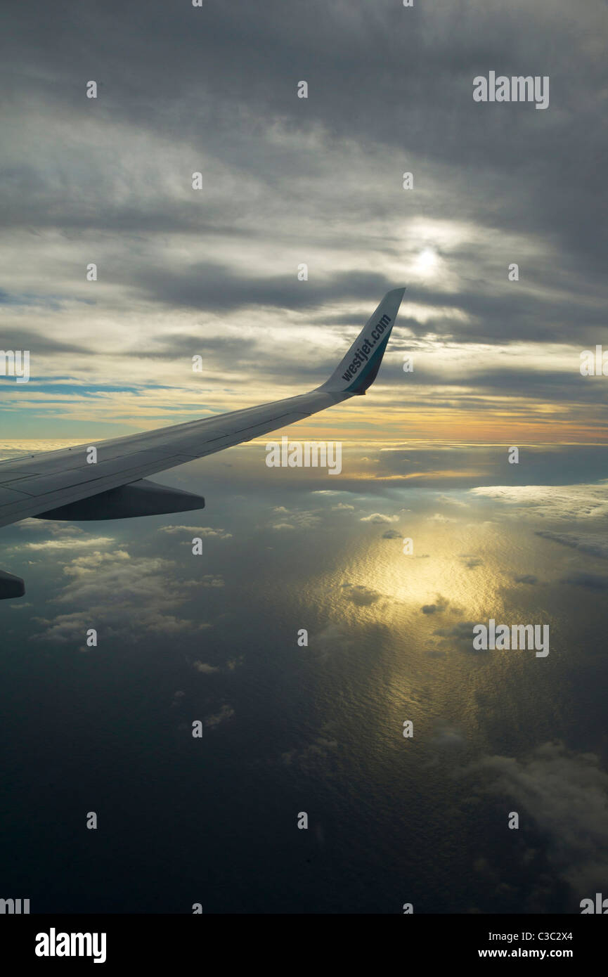 View of clouds in the sky from an airplane window Stock Photo - Alamy