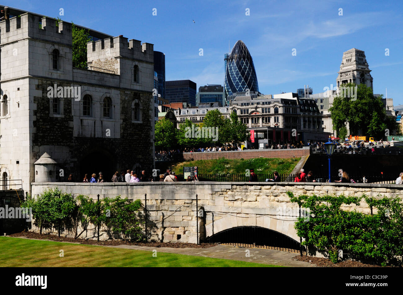 The West Gate to The Tower of London, with The Gherkin building in the ...
