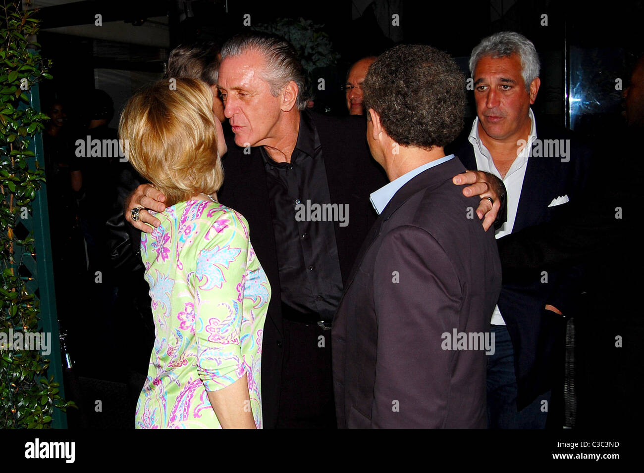 Pat Riley Miami Heat general manager greeting friends as he leaves Mr ...