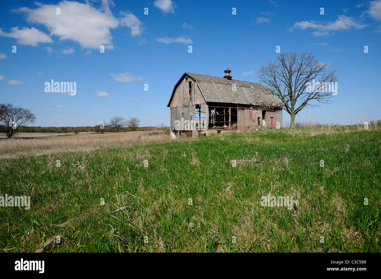 Old barn rotting on a rural farm landscape Stock Photo - Alamy