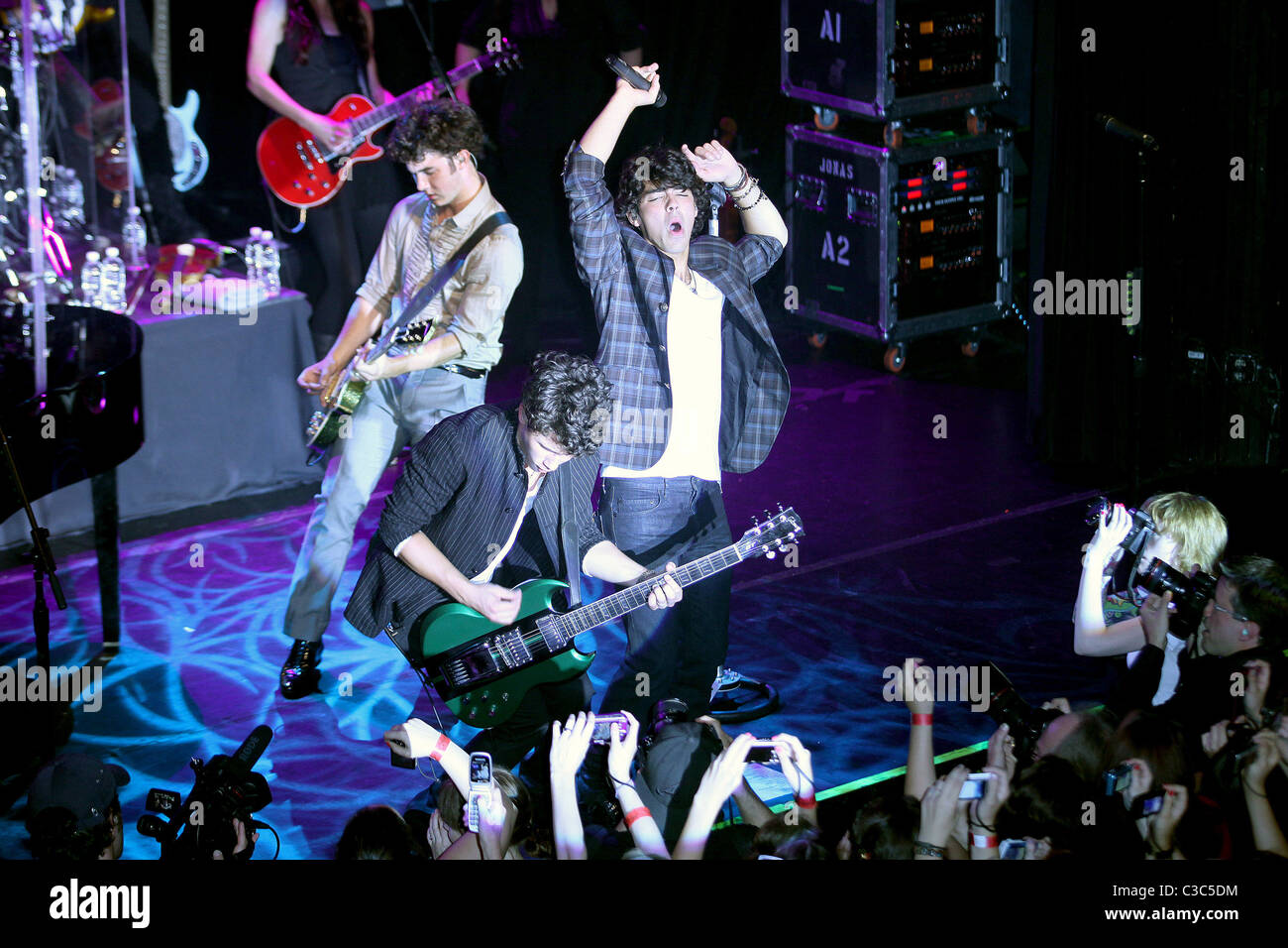 Jonas Brothers performing a free concert at Irving Plaza to promote ...