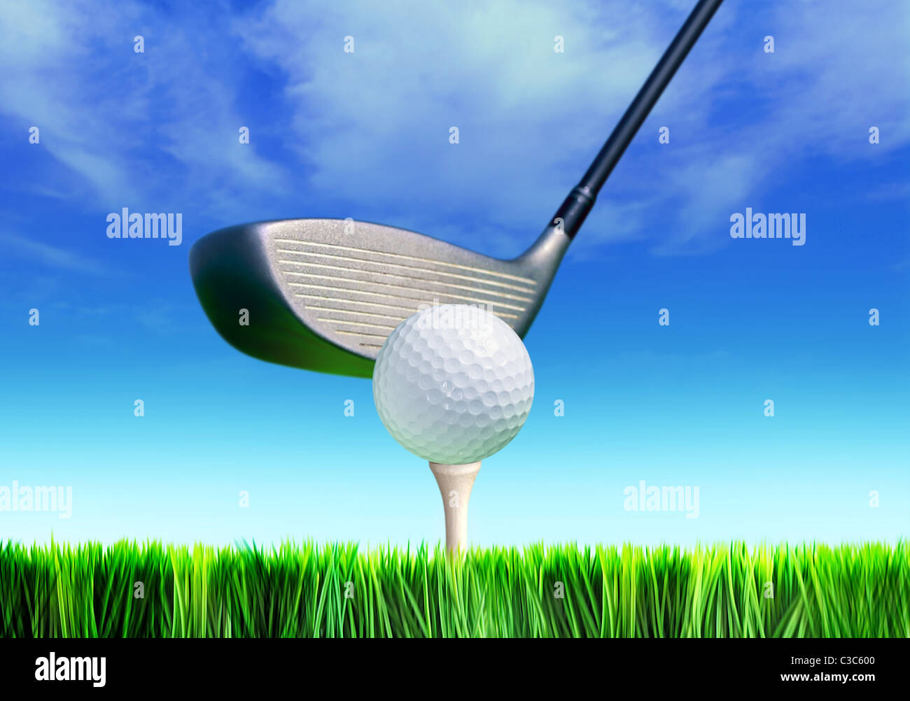 golf ball on course in front of driver Stock Photo - Alamy