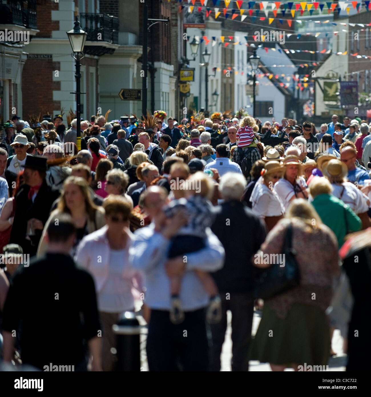 Crowds of people at the Sweeps Festival in Rochester in Kent in the UK ...