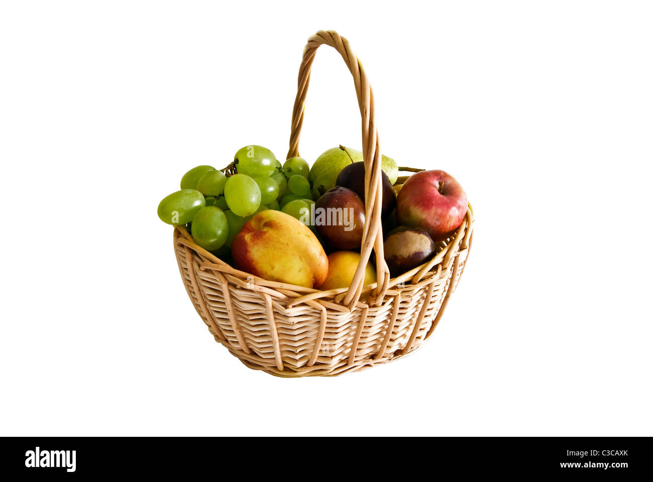 fruit in a basket are isolated on white Stock Photo - Alamy