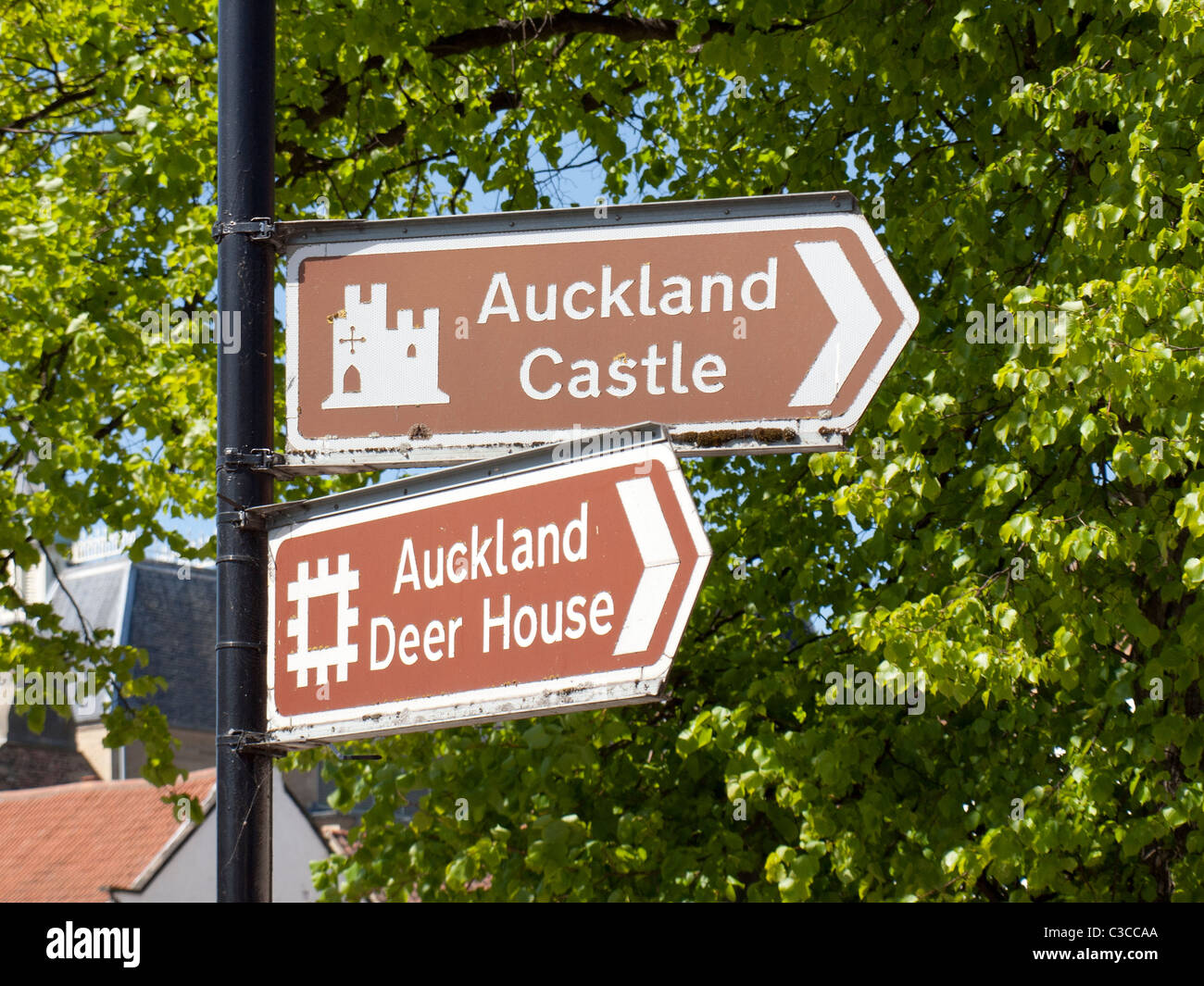 Tourist sign post in Bishop Auckland Market place showing the way to ...