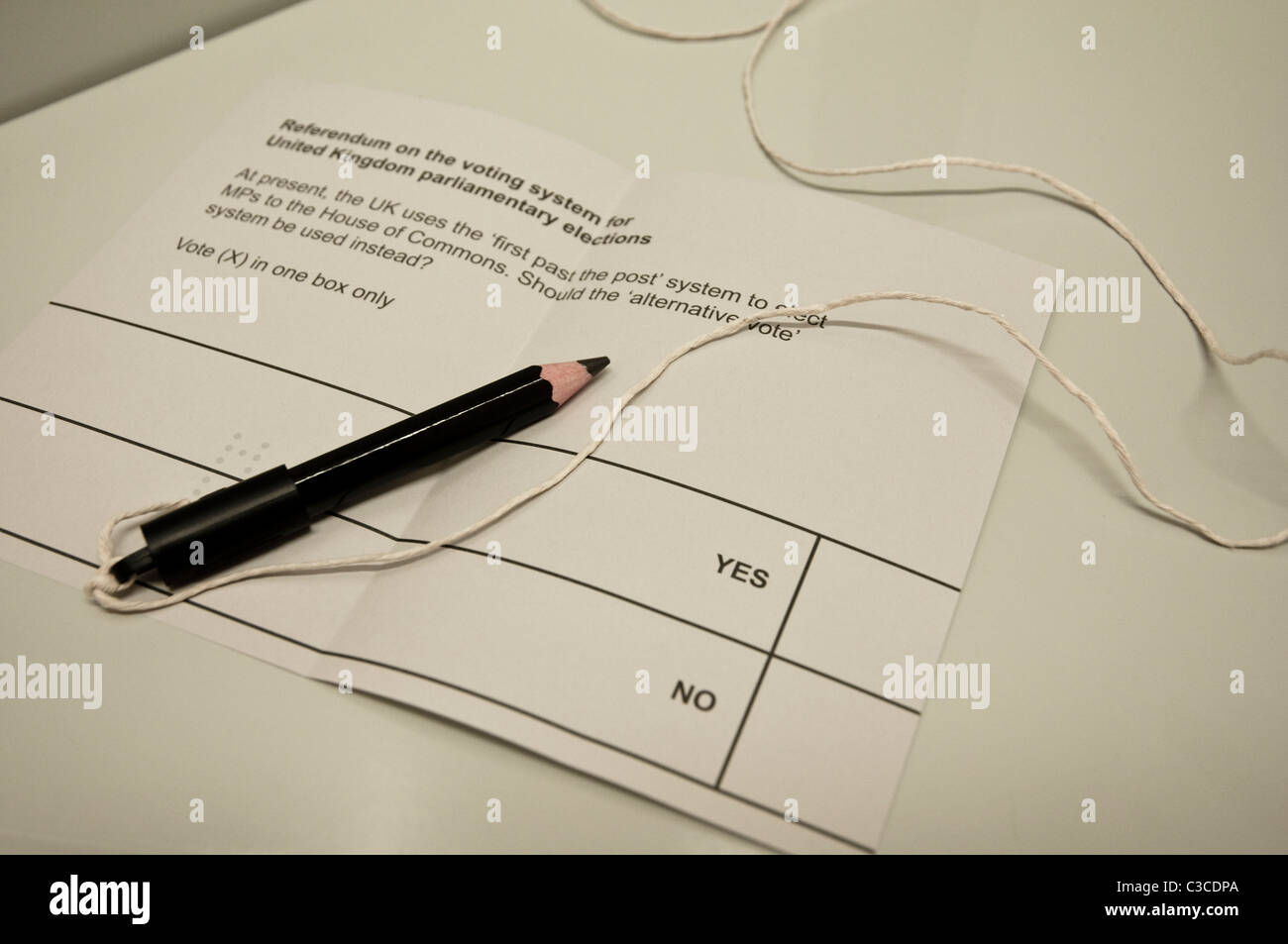 AV voting paper and pencil within voting booth inside an English ...