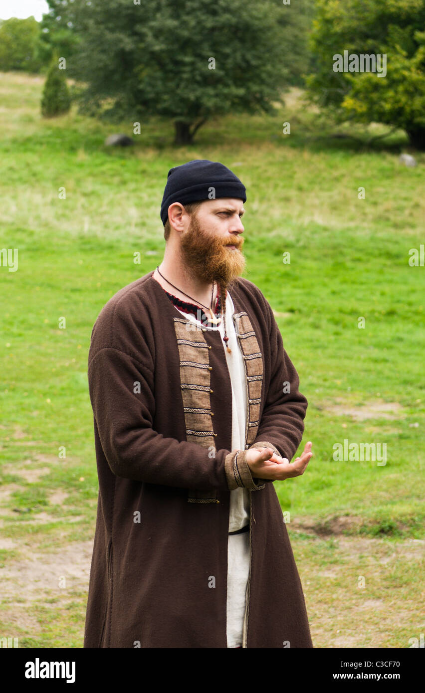 Male guide dressed as a Viking at the World Heritage viking settlement ...