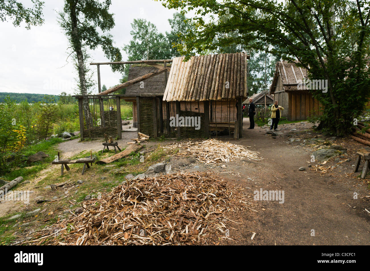 Visitors in the reconstructed part of Birka, the World Heritage Viking ...