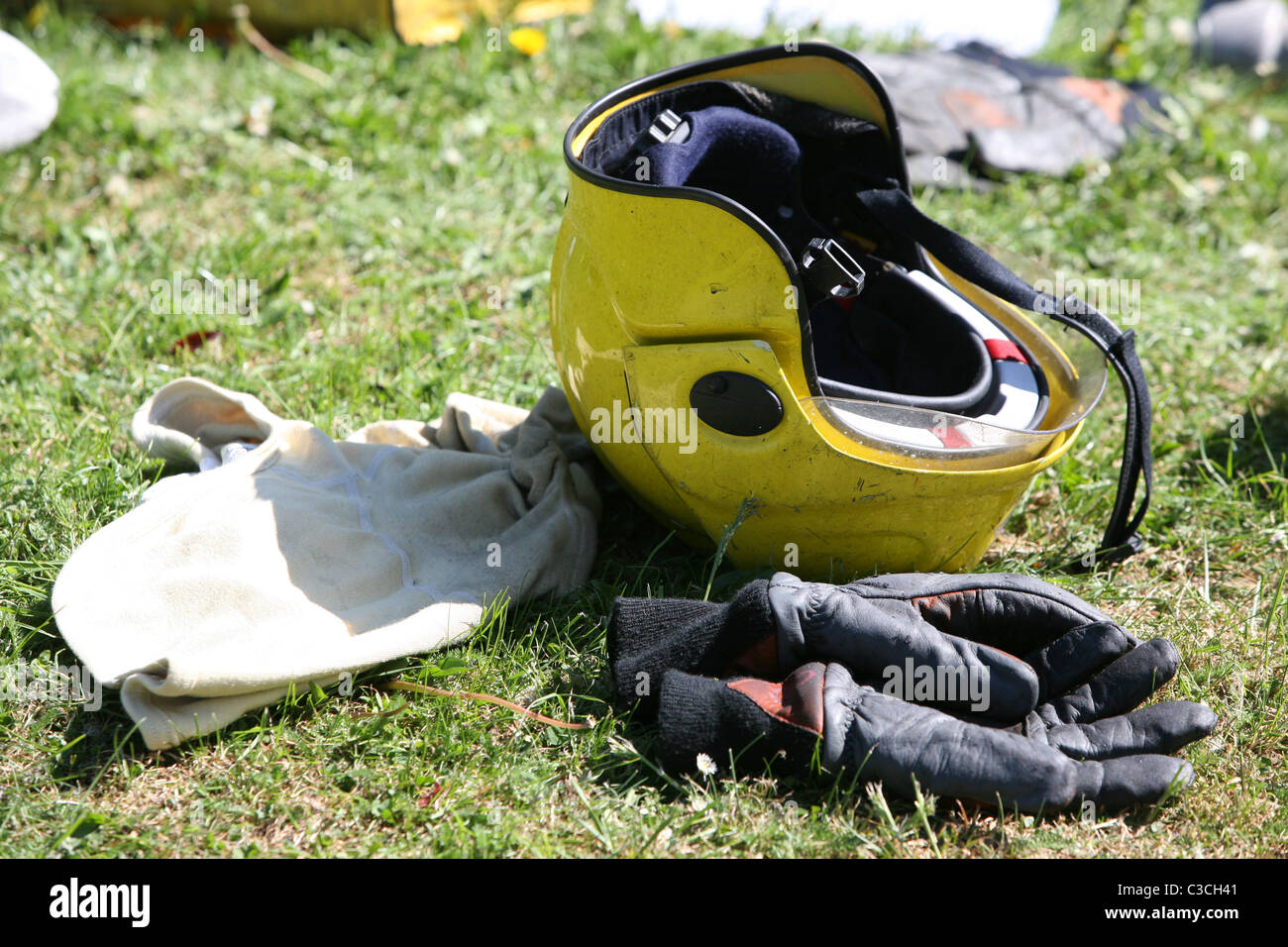 firefighters kit on the ground Stock Photo - Alamy