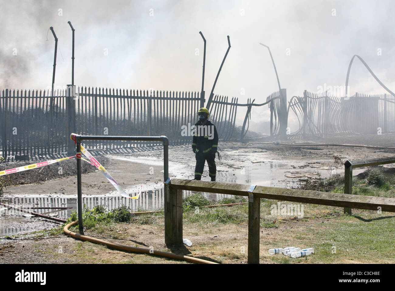 a firefighter at a large fire Stock Photo - Alamy